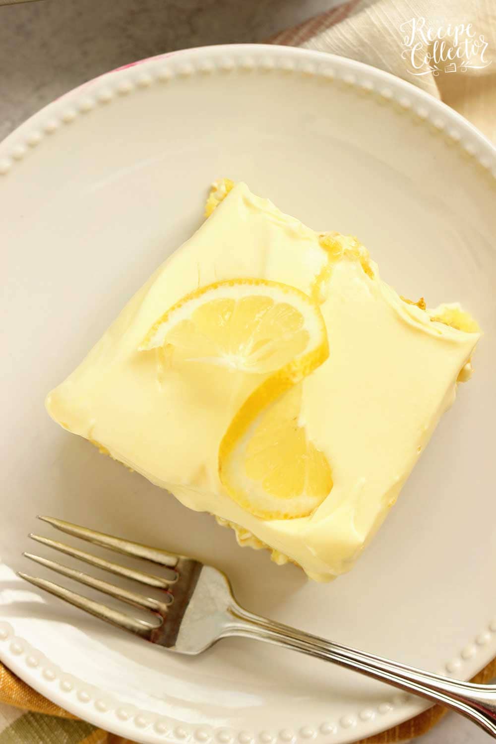 Triple Lemon Poke Cake - Diary of A Recipe Collector